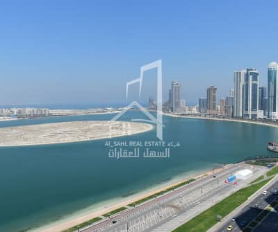 An apartment with a charming view of Al Khan Lake and ideal spaces in ...