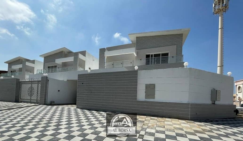 A beautiful villa for rent in Ajman, Al Rawda 2, featuring a charming view on the corner of a ...