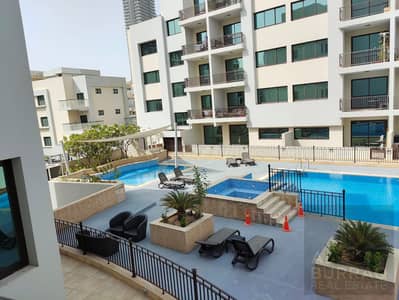 Spacious 1BHK Apt in JVC | pool and park view, nice layout | Bayut.com