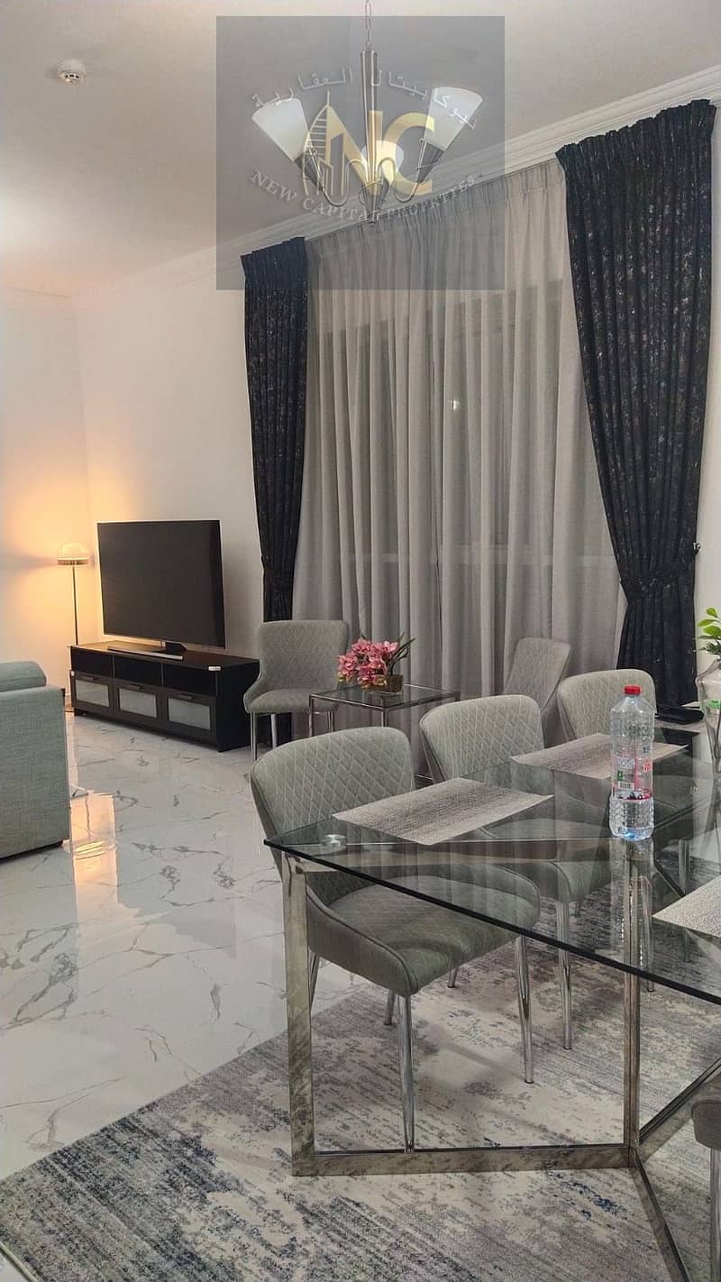 ((In Al Waha Towers with gym, swimming pool and parking)) Two rooms and ...