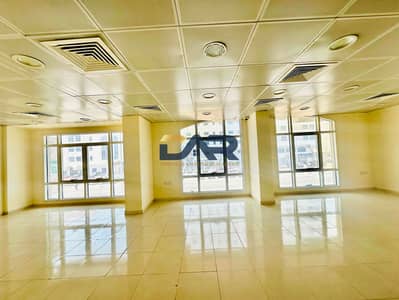 “Premium Office Rental in Shabiya 12: Open Hall, Tiled Flooring ...