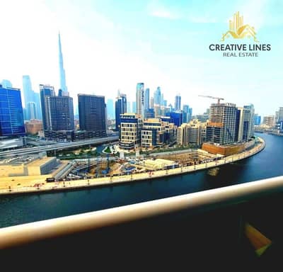 Amazing view of Dubai skyline Burj Khalifa view Canal view Full amenities Maid's room | Bayut.com