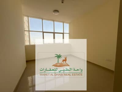 First tenant, two rooms and a hall for annual rent in Sharjah in Al Nahda 1 with parking and a ...