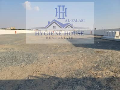A plot of land for annual rent in Al Sajaa, area 60 thousand square ...