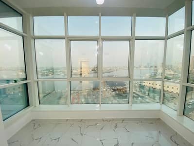 Two bedrooms and a hall in Al Waha Towers with a full open view of ...