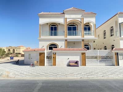 For sale, a two-storey villa in Al Rawda area - a villa with a modern ...