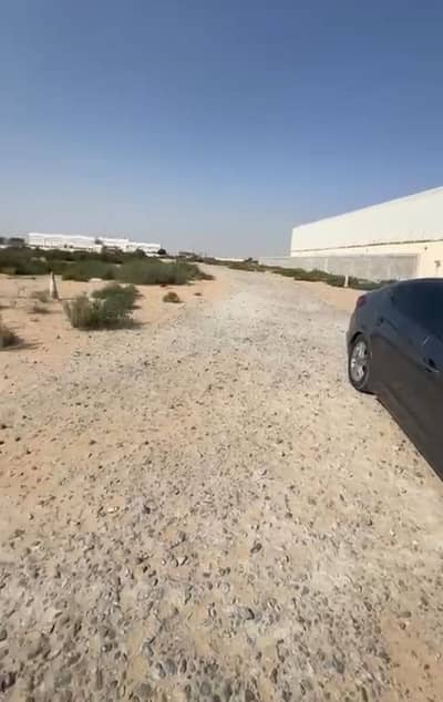 For sale, a corner plot of land in Sharjah, a main street, Al Sajaa ...