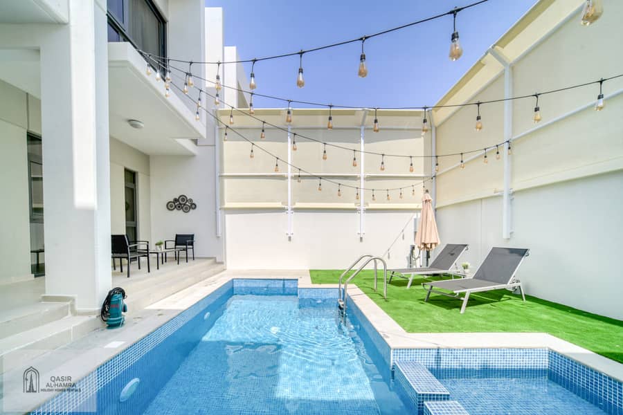 Furnished 4BR home with Private Pool in Damac Hills 2 | Bayut.com