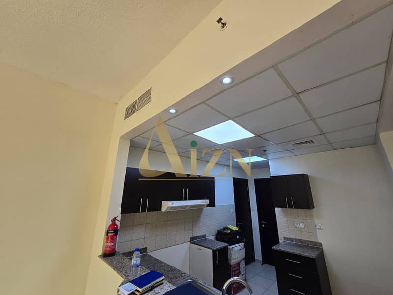 Bright & Airy 3-Bedroom | Queue Point, Liwan | 95K | 4 Cheques | Bayut.com