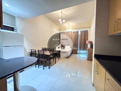 Fully Furnished Studio in Julphar Residence Tower | Bayut.com