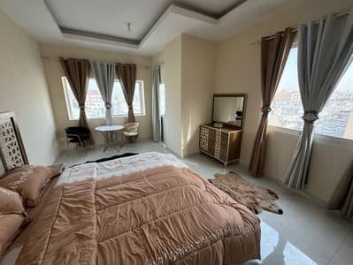 Large studio with balcony, separate kitchen and separate sitting area ...