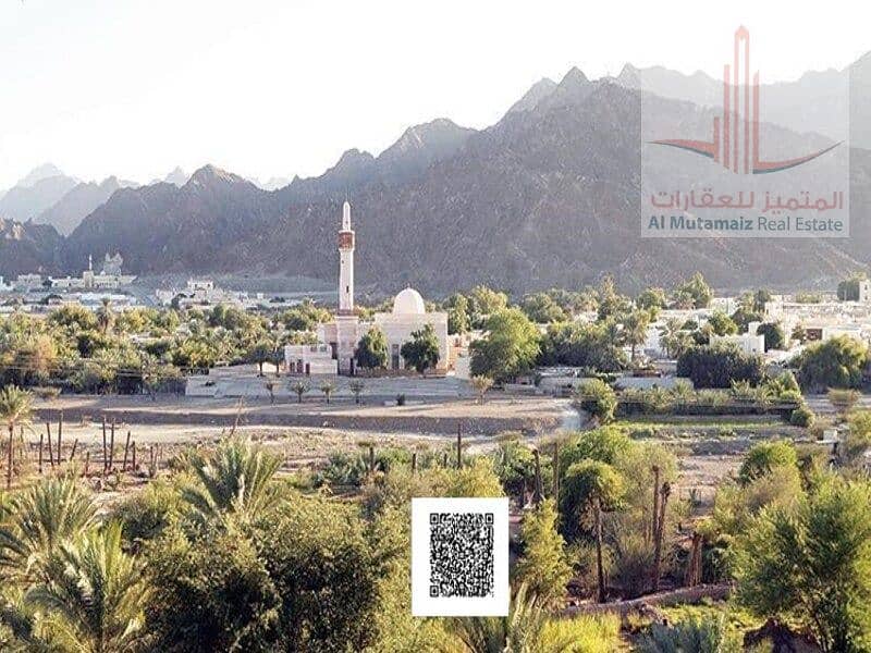 Land in Masfout, in a prime location and at a bargain price - suitable ...