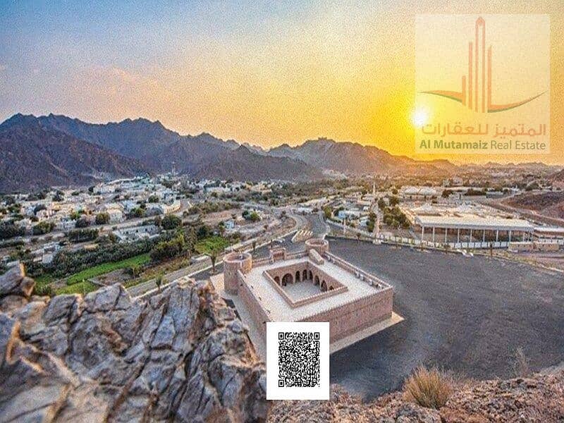 Land in Masfout, in a prime location and at a bargain price - suitable ...