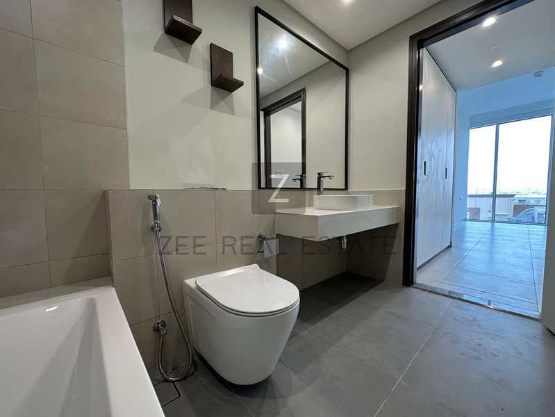 Modern 1BR in Wasl1 | Rooftop Pool, Gym & Sky Track | Vacant Soon ...