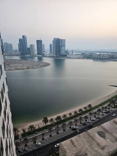 For sale in Al Rand Tower with a side view of the lake | Bayut.com