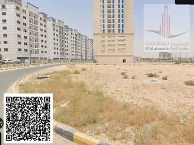 Land for sale in Al Yasmin, suitable for residential or commercial use ...