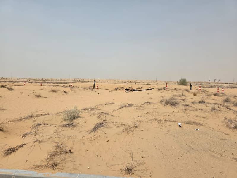 Two industrial plots for sale in Al Qasimia City, Phase 4. | Bayut.com