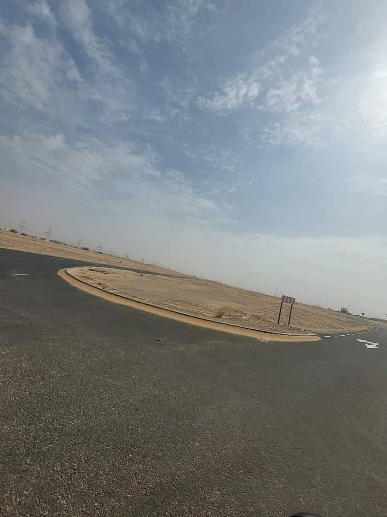 Two adjacent residential plots for sale in Sharjah, Al Rahmaniya suburb ...