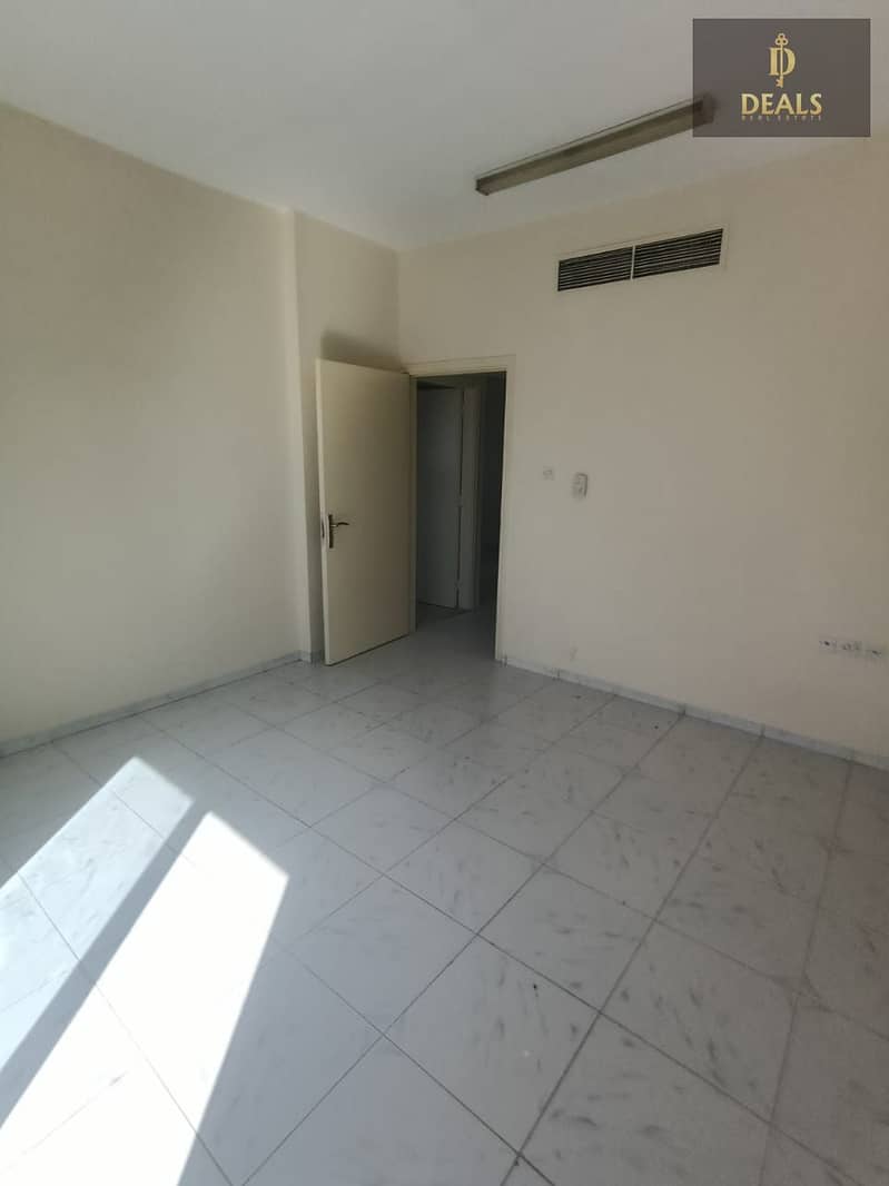 One-Bedroom Apartment with Dual Balconies and Open View in Al Hamidiya ...