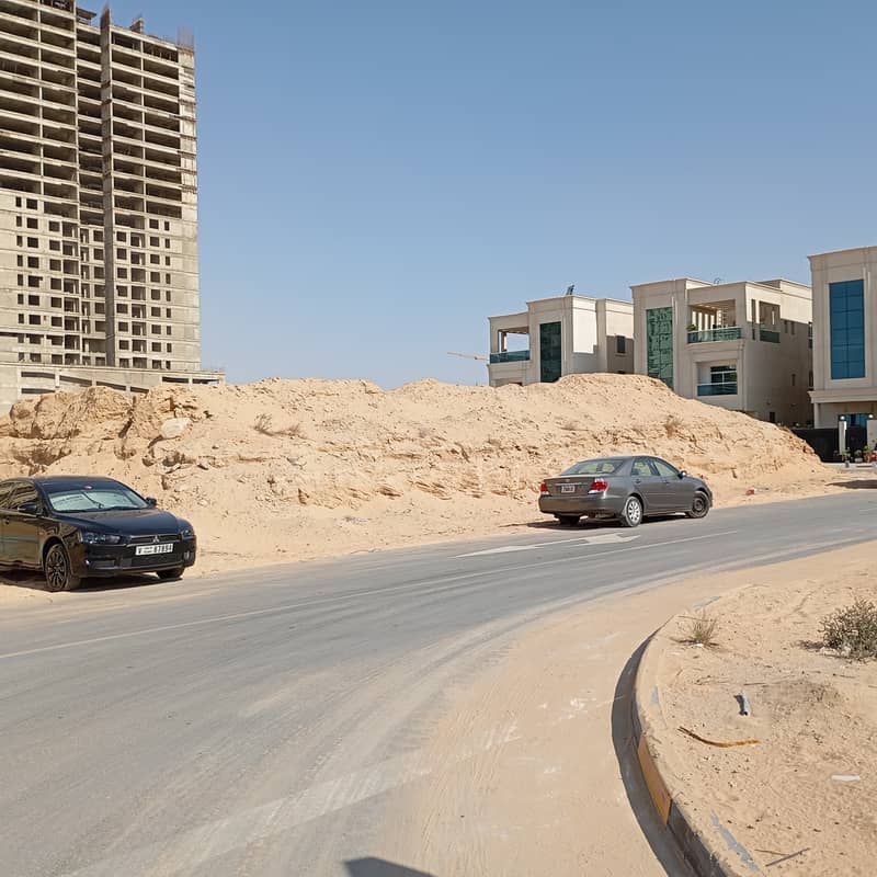 11 residential villa plots including fees in Al Amerah, Ajman, next to ...