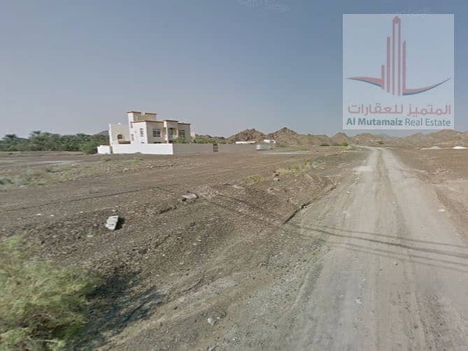 Two plots of land for sale in Masfout area, Basin 1, very prime ...