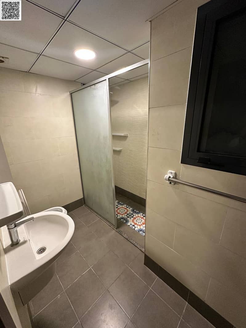 A uniquely designed one-bedroom apartment with hotel-style amenities in ...