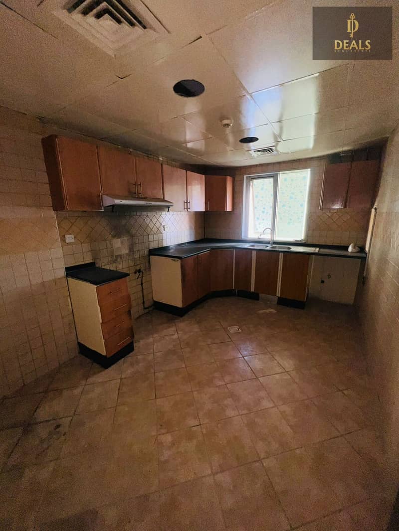 Spacious 2-Bedroom Apartment with Living Room for Rent in Al Rashidiya ...