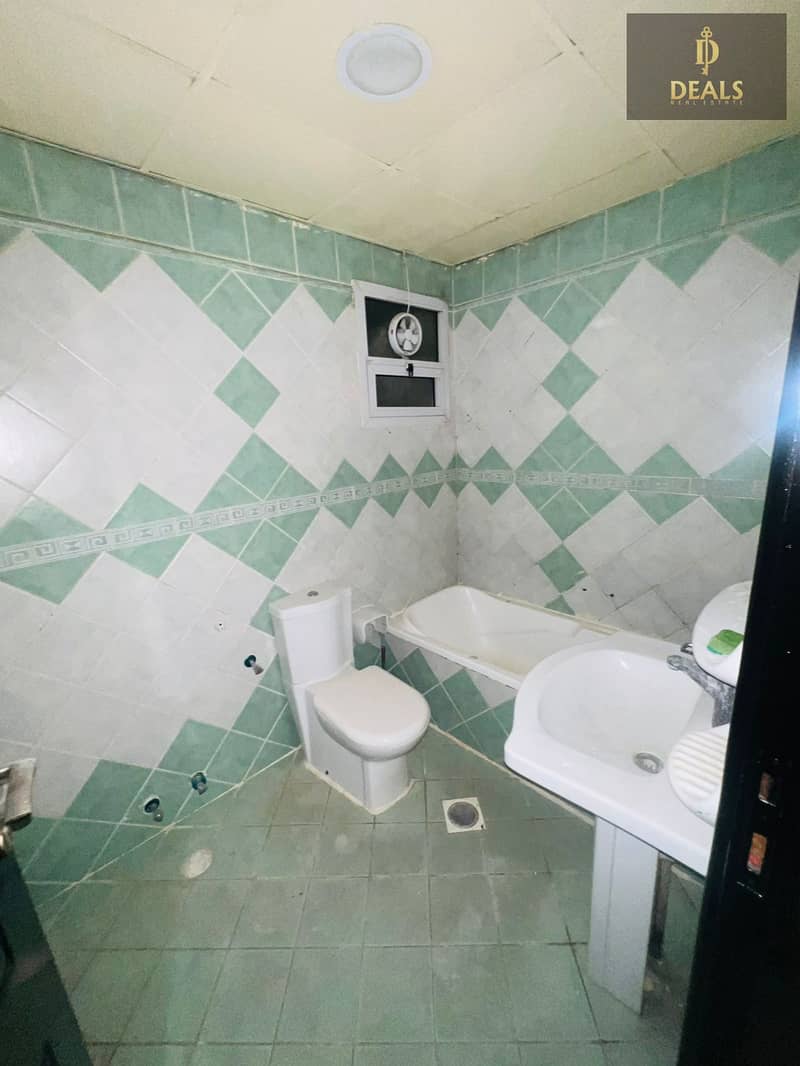 Spacious 2-Bedroom Apartment with Living Room for Rent in Al Rashidiya ...