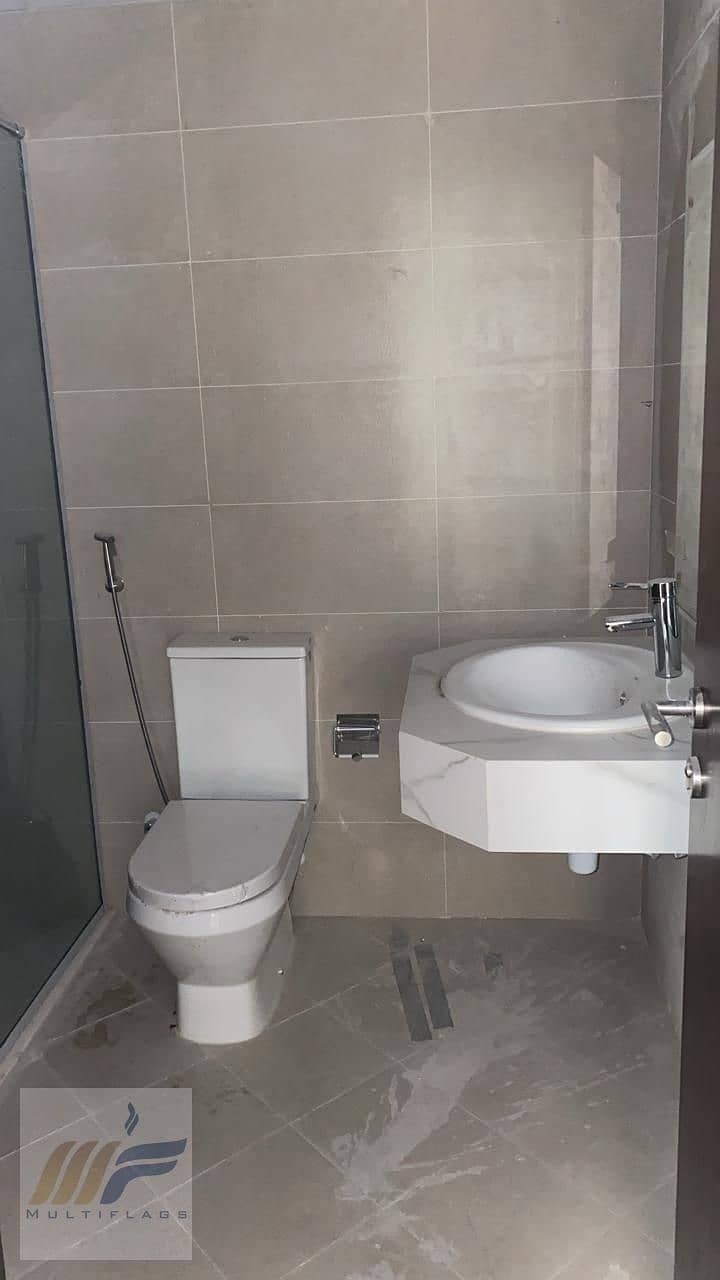 Own a spacious two bedroom apartment in Princess Village Ajman with ...