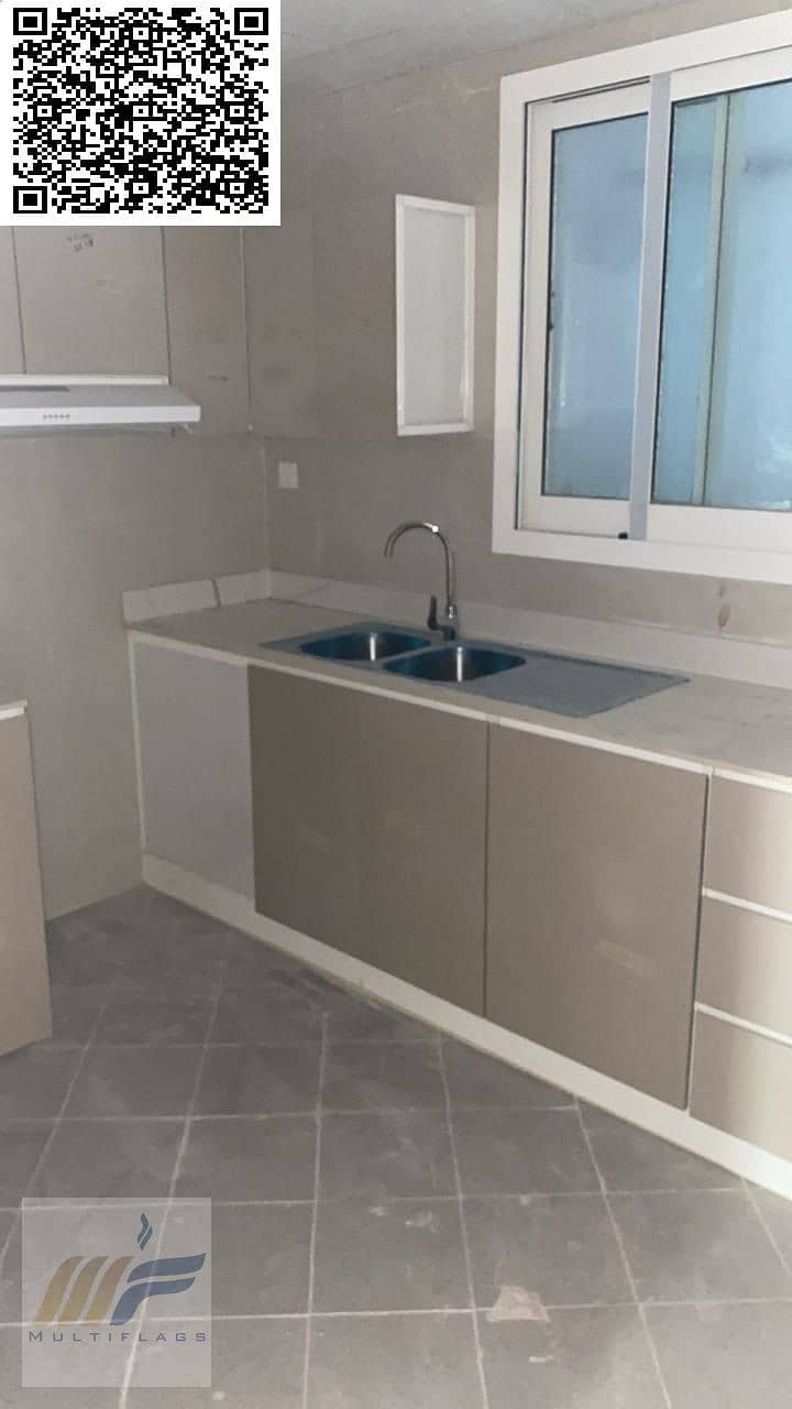 Own a spacious two bedroom apartment in Princess Village Ajman with ...