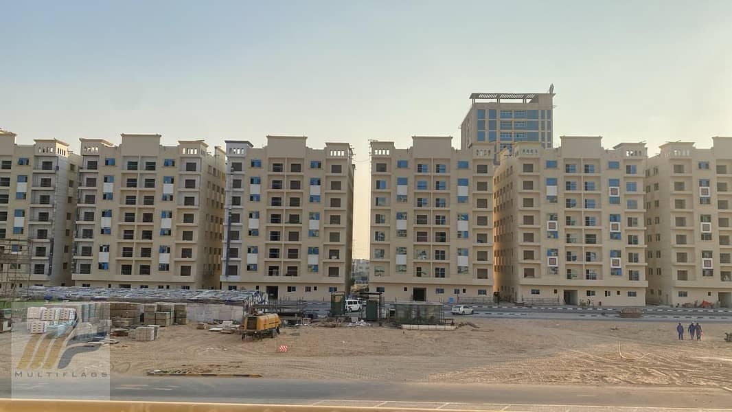 Own a spacious two bedroom apartment in Princess Village Ajman with ...