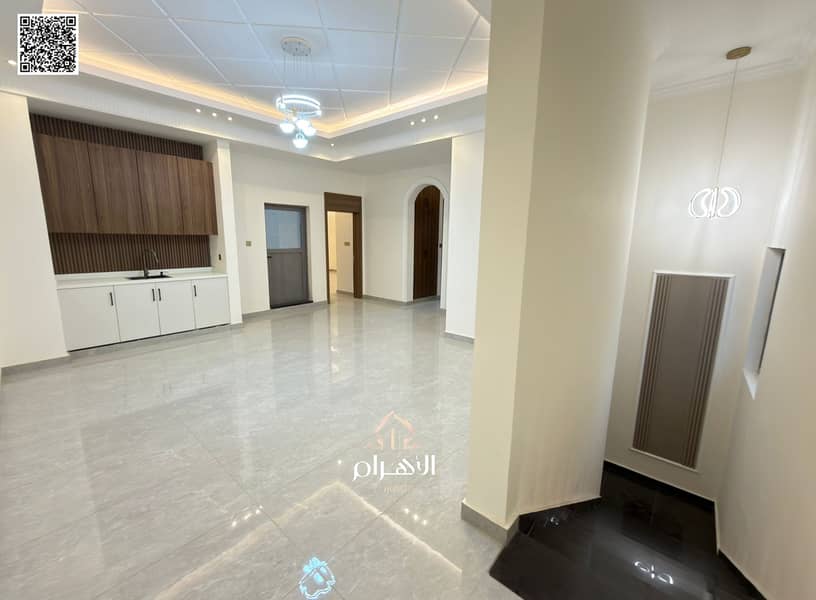Luxury villa for sale in Al Bahia area, featuring two floors and a ...