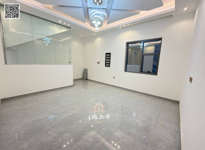 Luxury villa for sale in Al Bahia area, featuring two floors and a ...