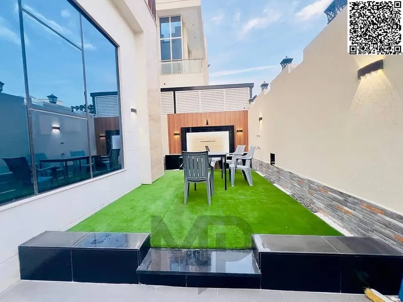 Luxury villa for sale in Al Bahia area, featuring two floors and a ...