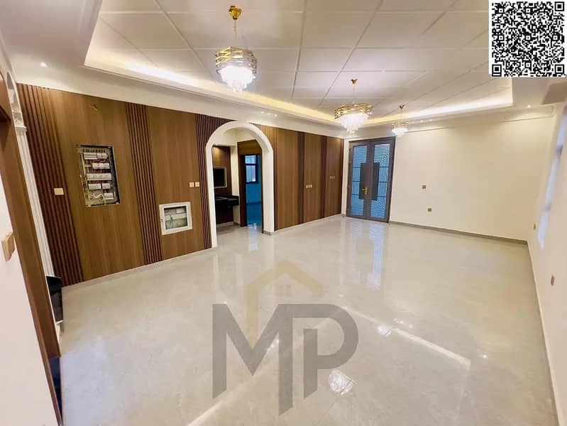 Luxury villa for sale in Al Bahia area, featuring two floors and a ...