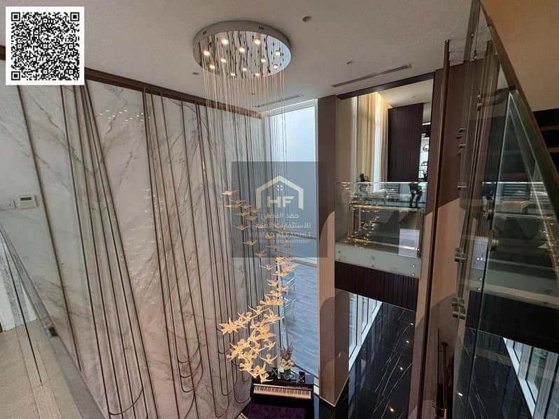 Villa for sale in Al Zorah area, surrounded by stunning natural scenery ...