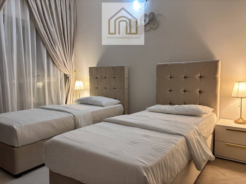 Elegant 2BR Holiday Home | Hotel-Style Comfort | Spacious 2BR | Ideal ...