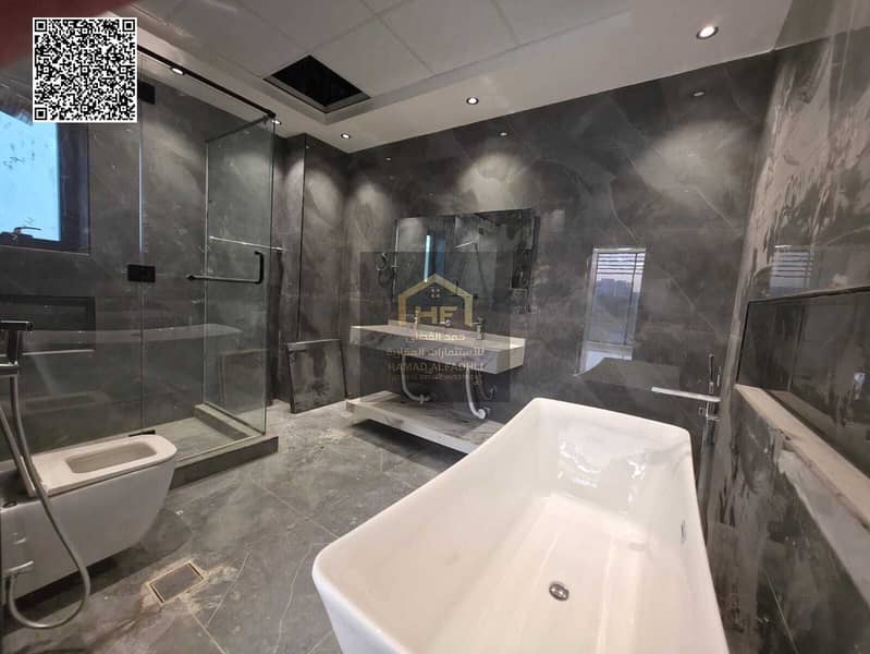 Luxury villa with a modern design, 5000 sq ft, with a garden, behind ...