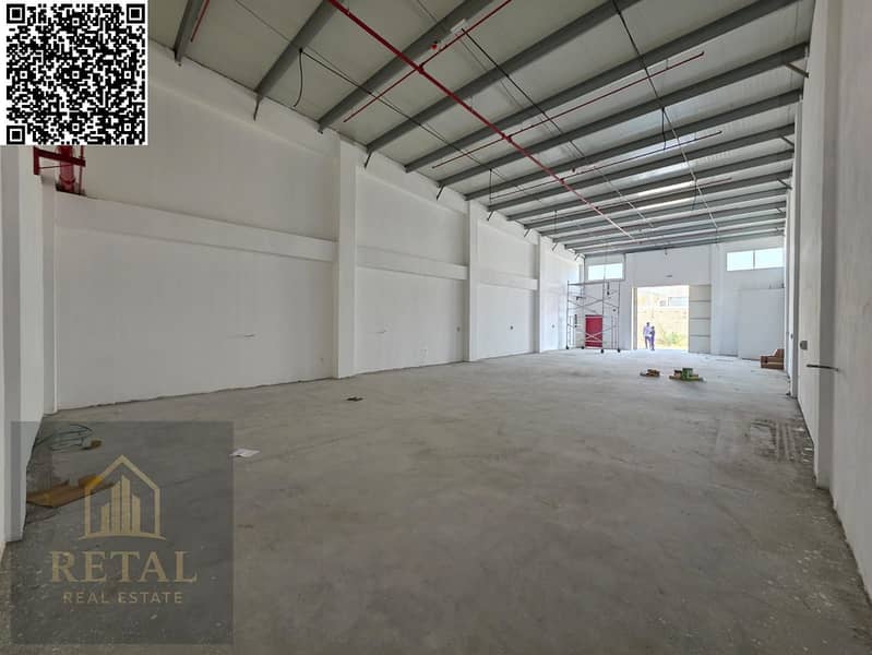 It is located on the main street, with a large sidewalk in front of it ...