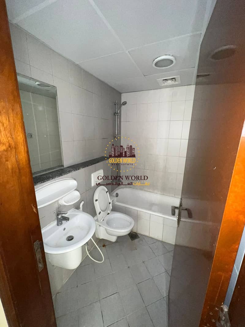 A distinctive apartment in Al Taawun, featuring one bedroom and a ...