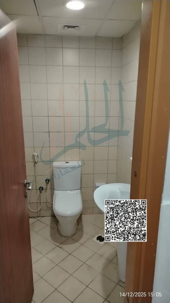 One bedroom and living room for sale in Lulu Towers Ajman complex with ...