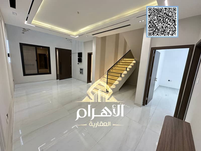 A luxurious home with a modern design, high-end finishes, and a garden ...