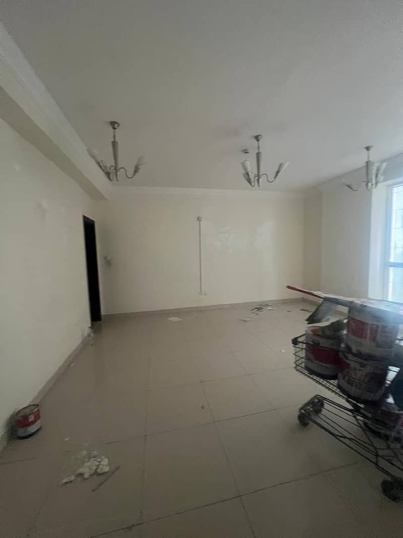 Two rooms and a hall in Al-Majaz 2 Cabinets, but a wall A large area ...