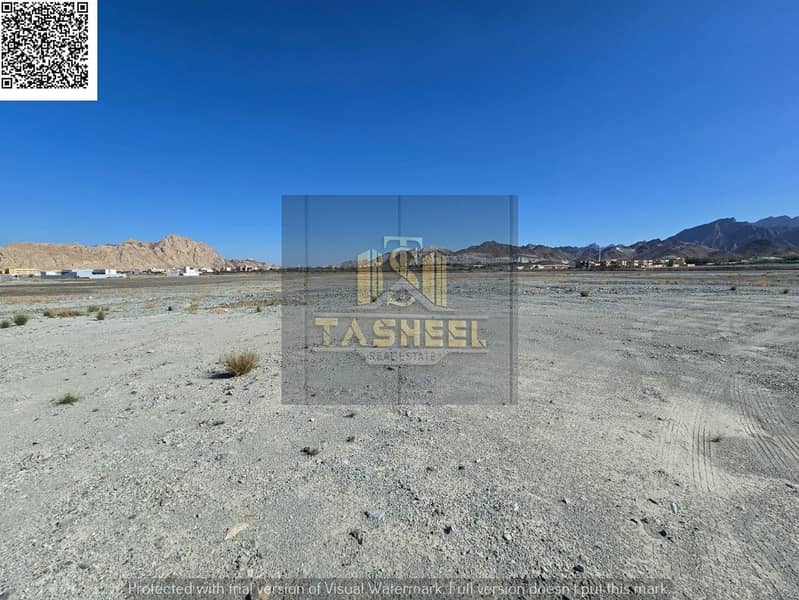 Land in Masfout, Basin 11, mountain view, very prime location, corner ...
