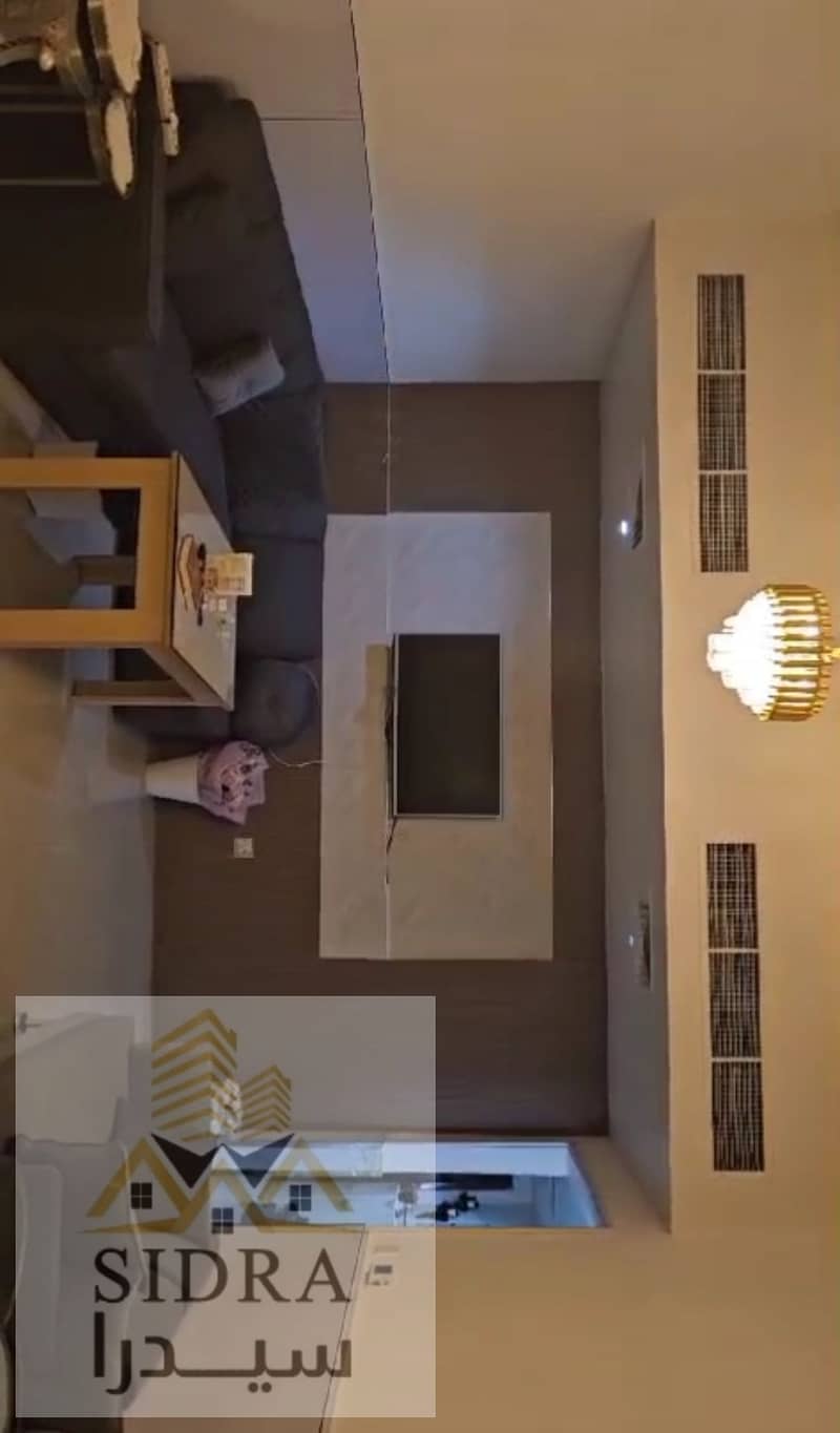 For sale: a two-bedroom apartment with a living room in Horizon Towers ...