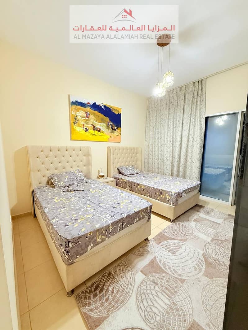 A fully furnished three-bedroom apartment in Al Mamzar for monthly rent ...
