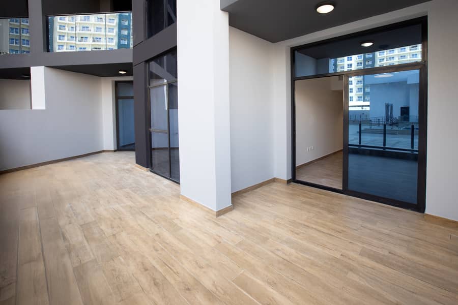 Spacious 2BHK | Maid Room | Podium | Liwan | Bayut.com