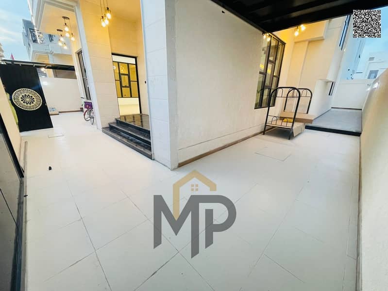 A luxurious and modern villa with high-end finishes and a private ...