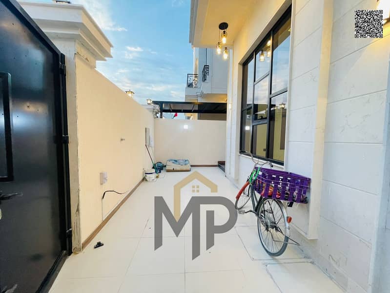 A luxurious and modern villa with high-end finishes and a private ...