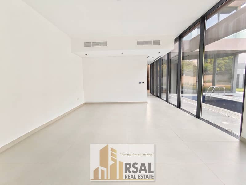 Gated community Luxurious 4BR with private pool Majlis Room | Bayut.com